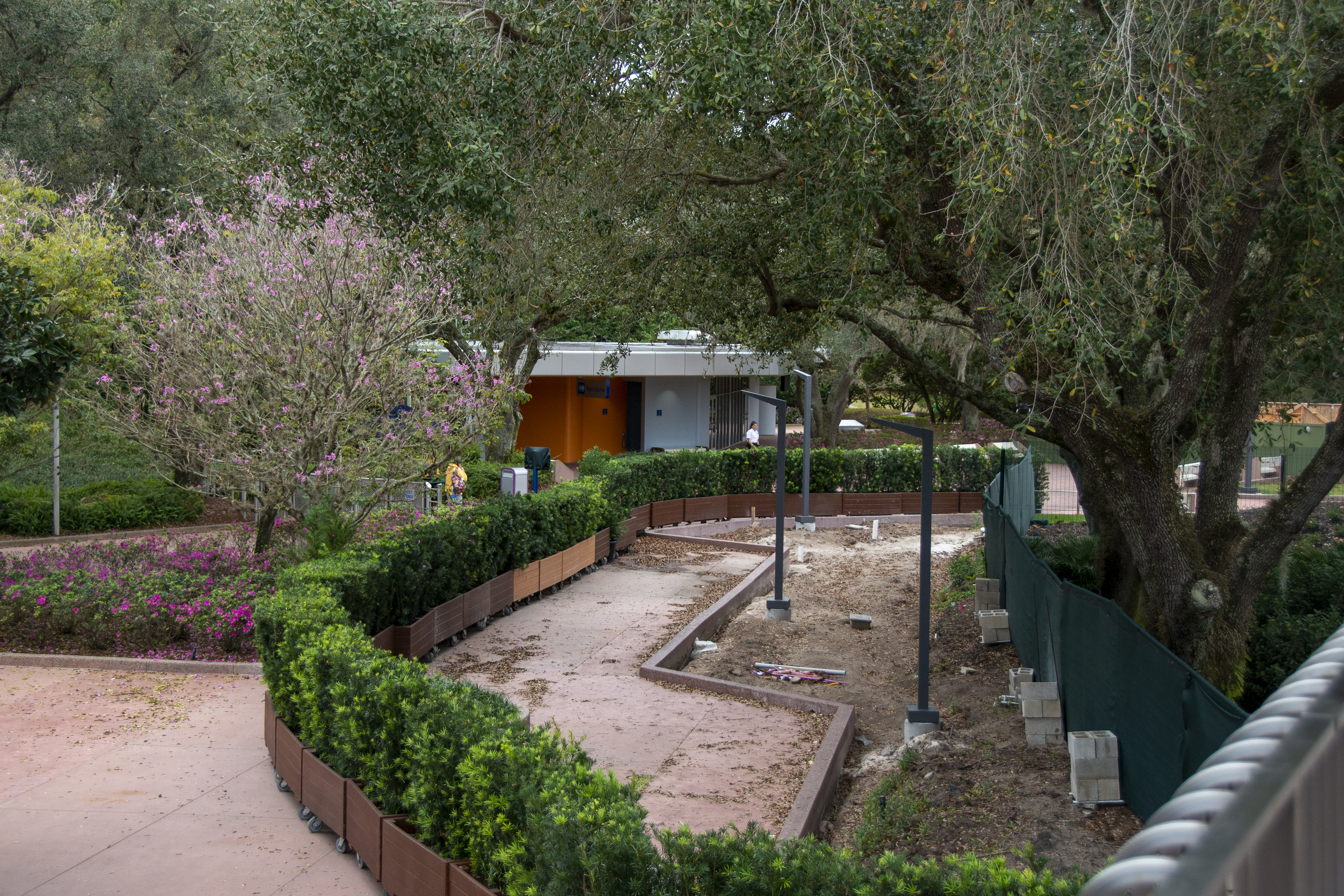 PHOTOS: EPCOT Entrance Enhancements Add New Paving, Planters Begin to ...